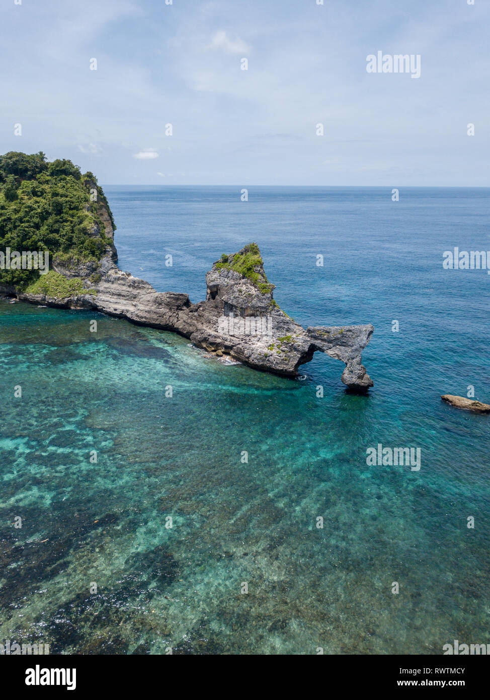 An aerial photo of the island in front of Atuh Beach on Nusa Penida ...