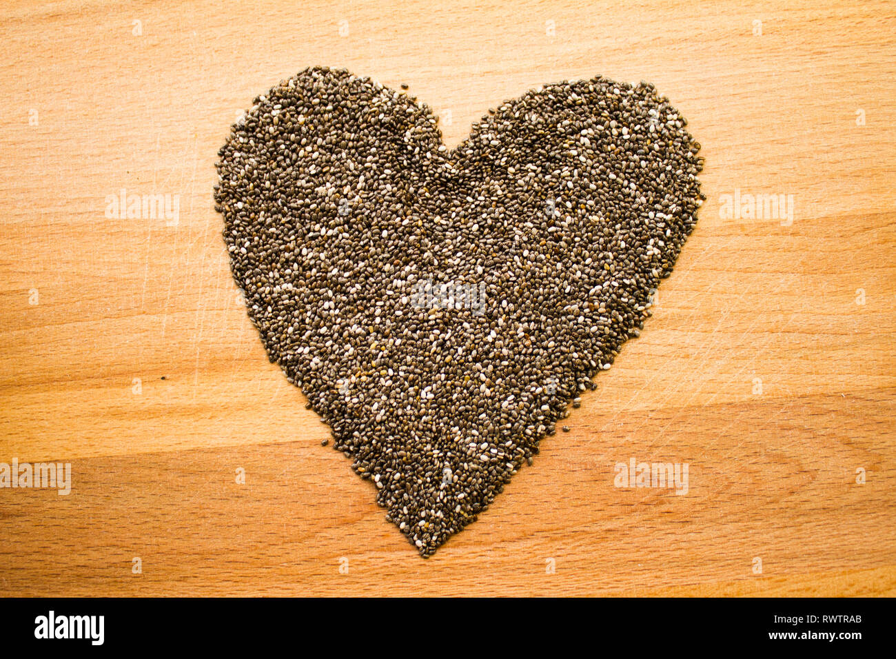chia seeds with wooden background Stock Photo - Alamy