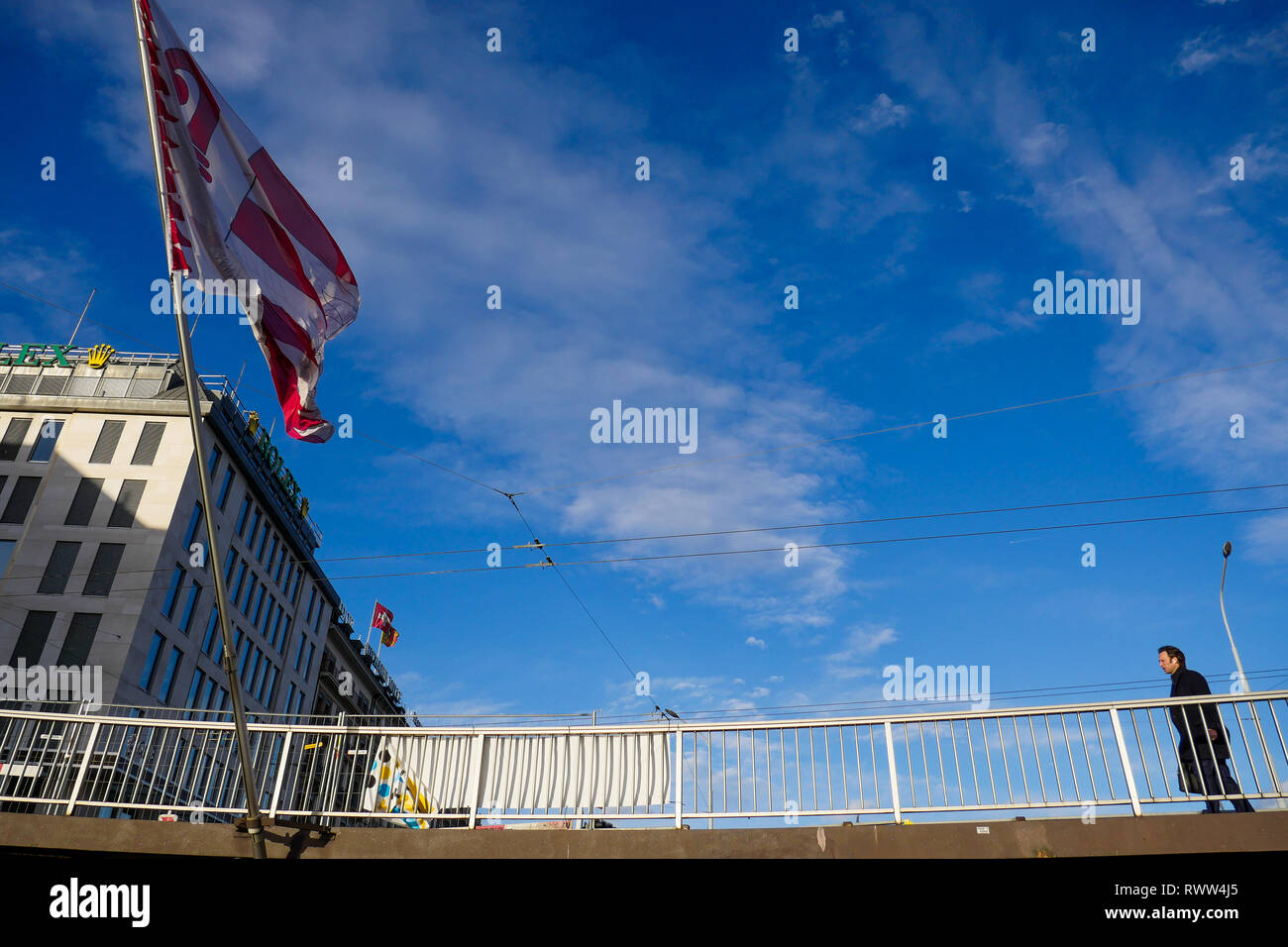 Flags of Swiss cantons fly in the wind, Mont-Blanc Bridge, Geneva ...