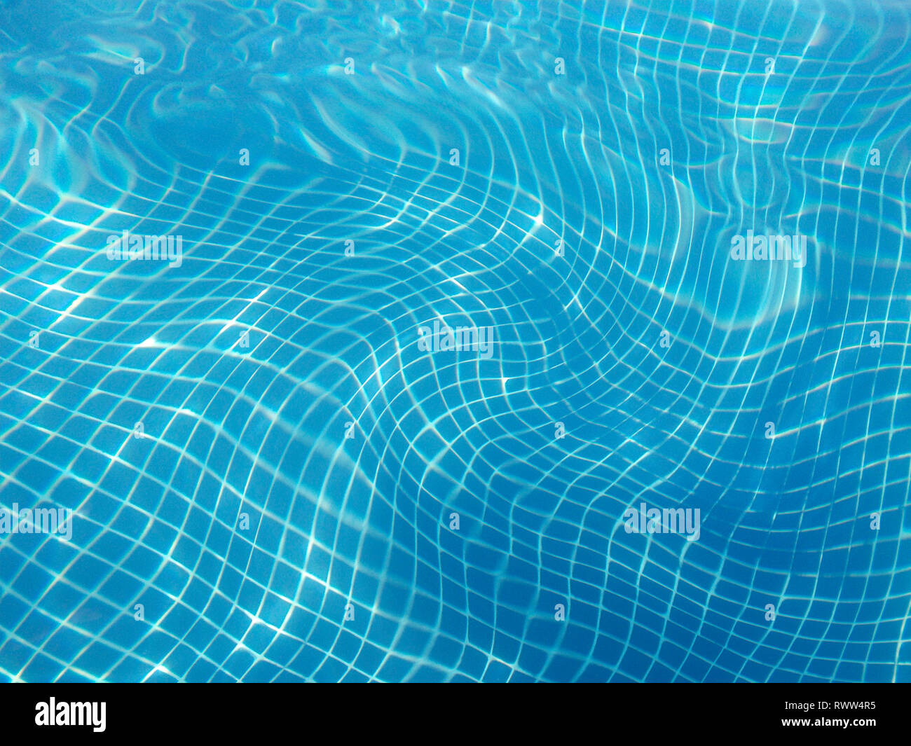 Water reflections on a swimming pool. Underwater photography ...