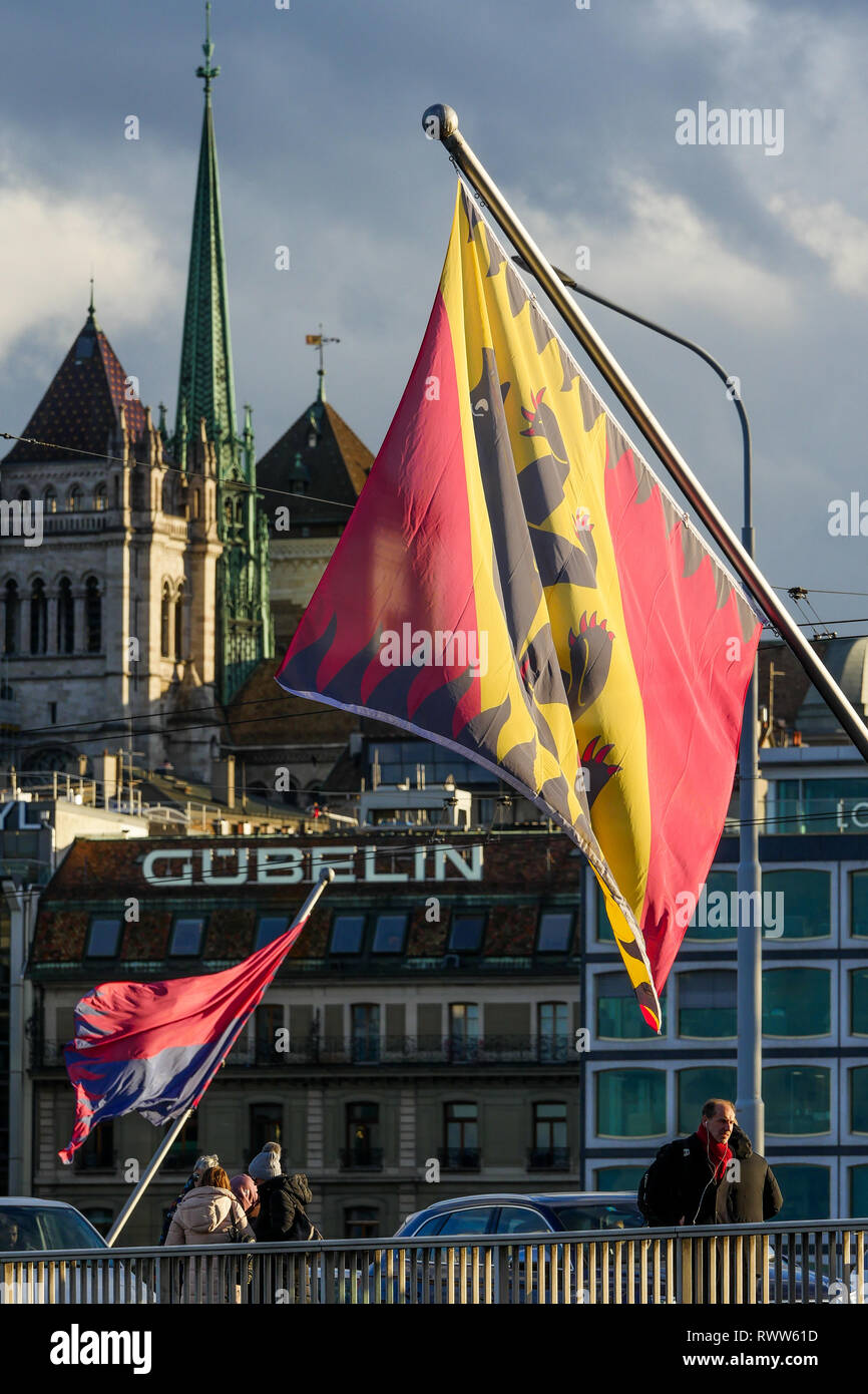 Flags of Swiss cantons fly in the wind, Mont-Blanc Bridge, Geneva ...