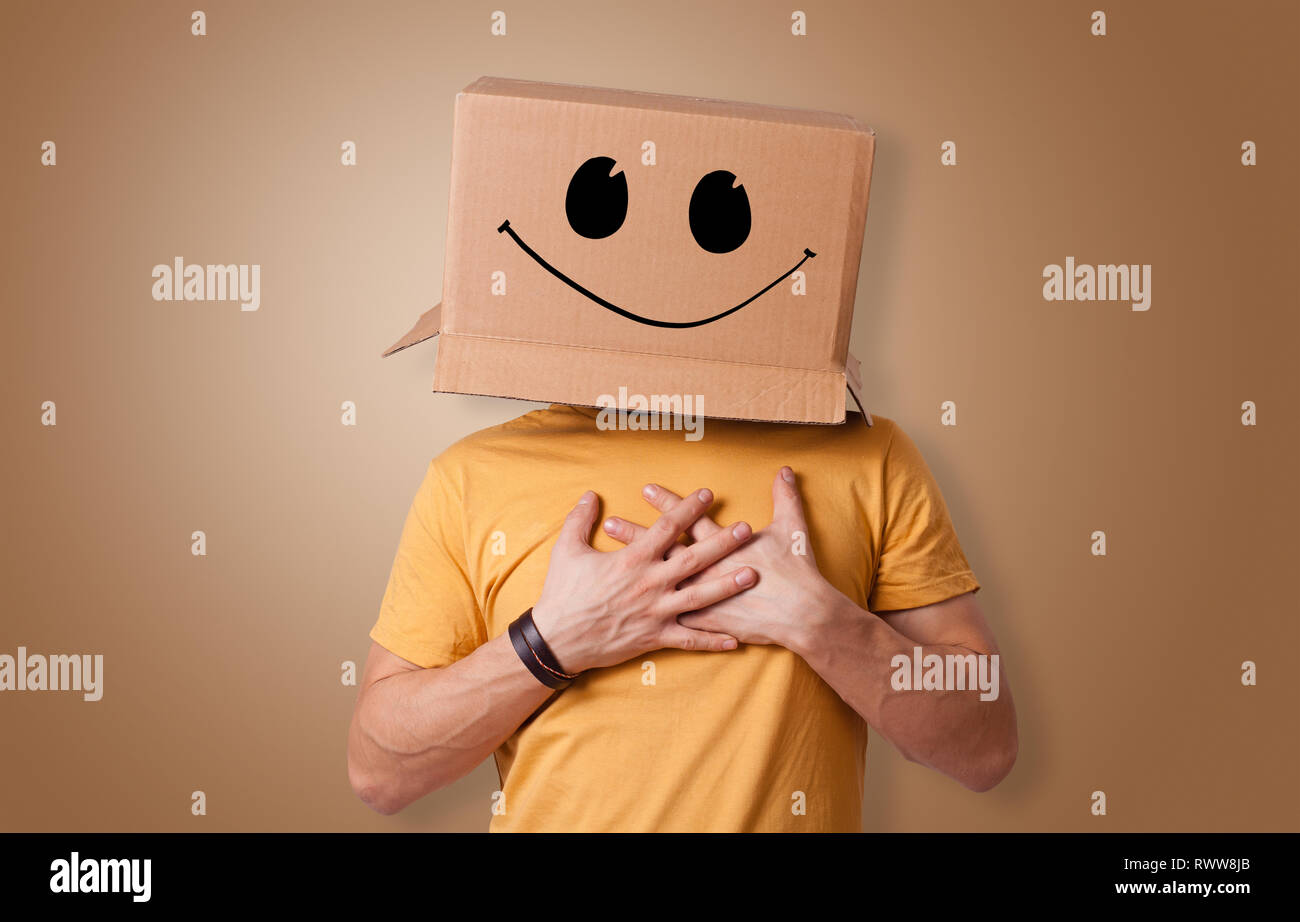 Man with cardboard box head Stock Photo - Alamy