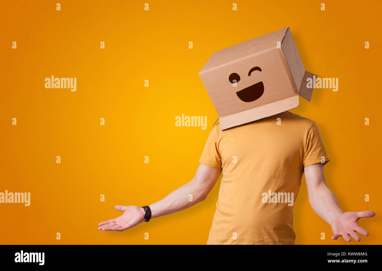 Funny man wearing cardboard box on his head with smiley face Stock ...
