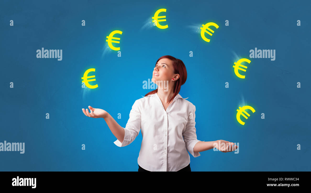 Young happy person juggle with euro symbol Stock Photo - Alamy