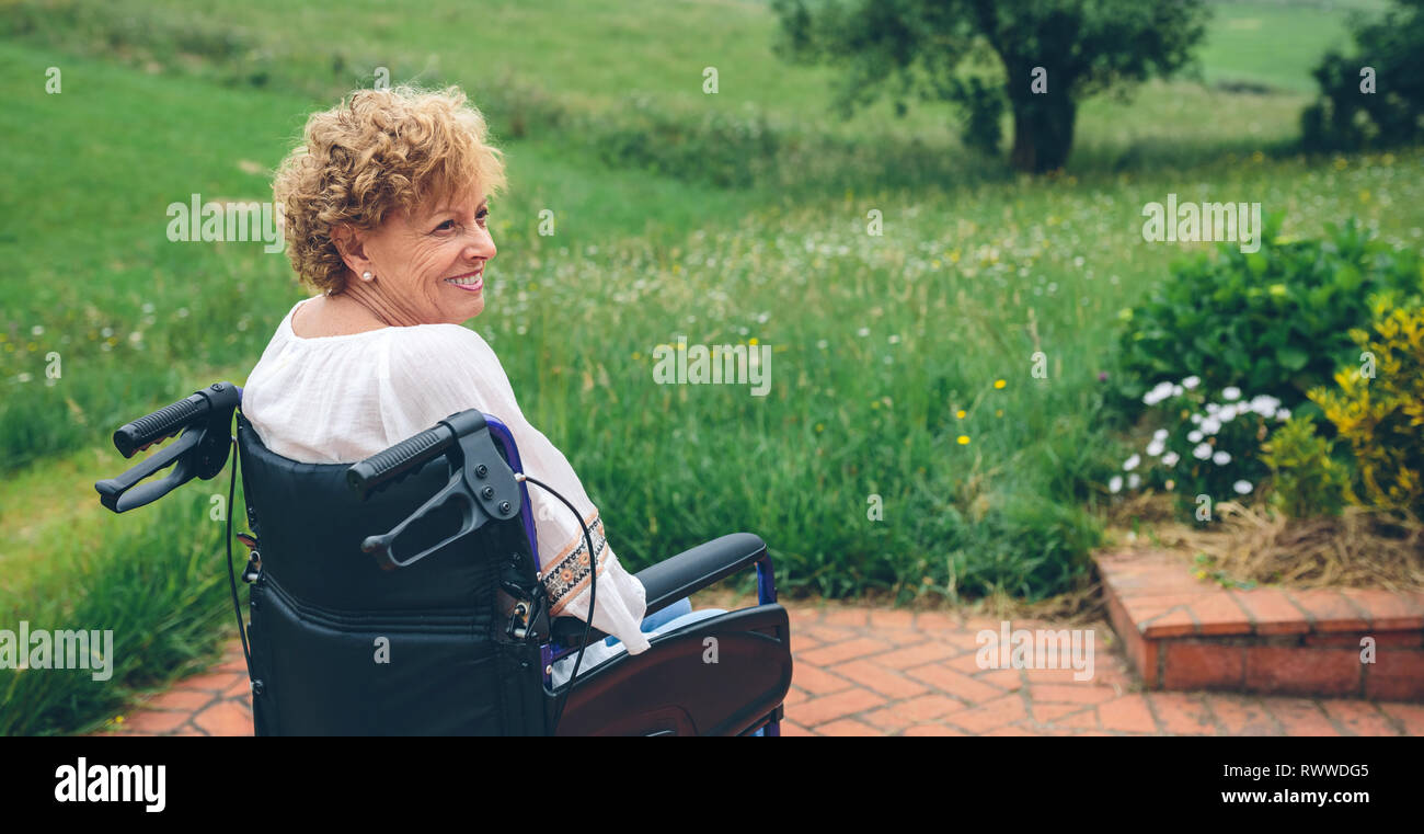 Senior woman in wheelchair Stock Photo - Alamy