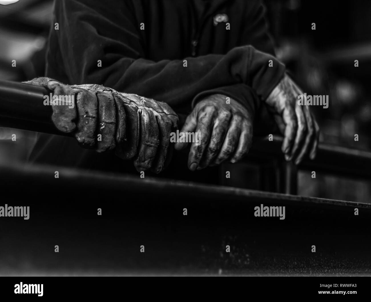 Black worker hands Black and White Stock Photos & Images - Alamy