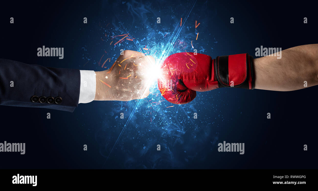 Two hands fighting with light, glow, spark and smoke concept Stock ...