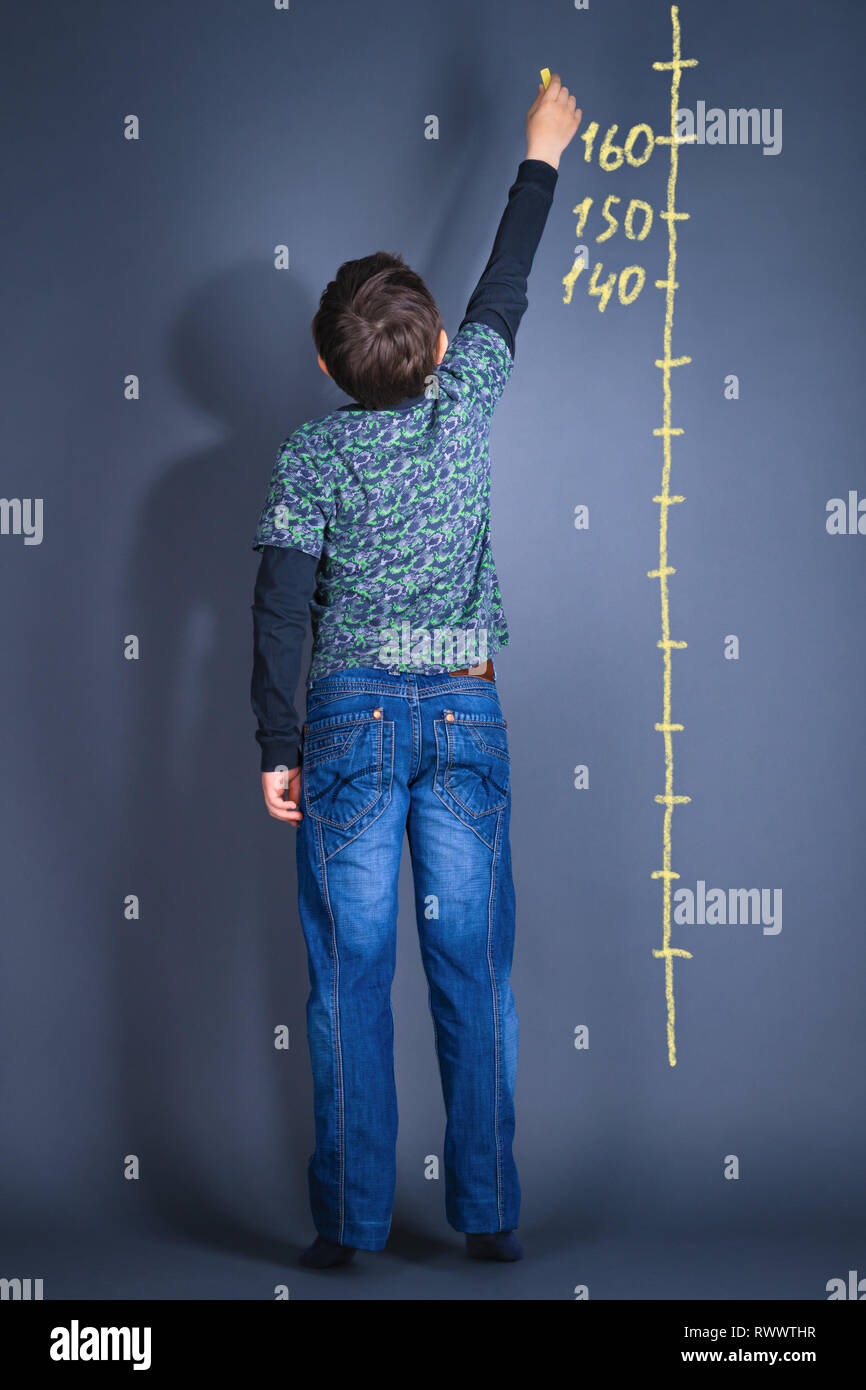 Boy height chart hi-res stock photography and images - Alamy