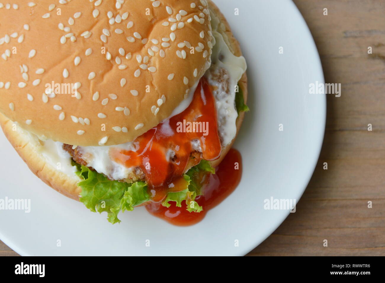 pork hamburger dressing ketchup on dish Stock Photo - Alamy