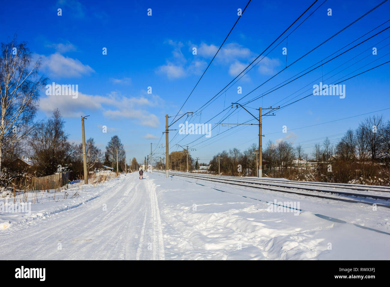Russian railway in winter. Sunny weather on a frosty snowy day. Winter ...