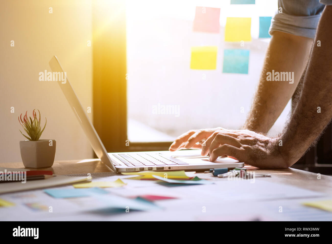 man searching and use computer, typing and working Stock Photo - Alamy