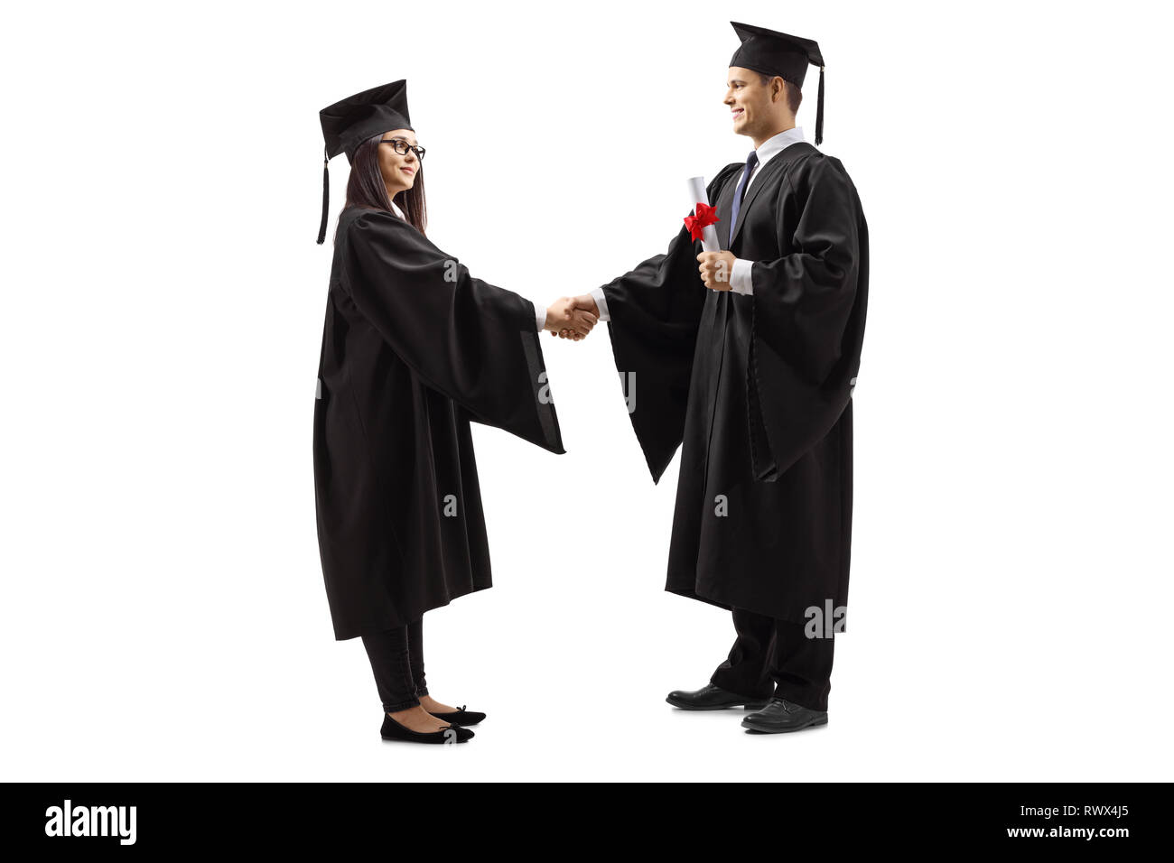 Education full length shaking hands gown hi-res stock photography and ...