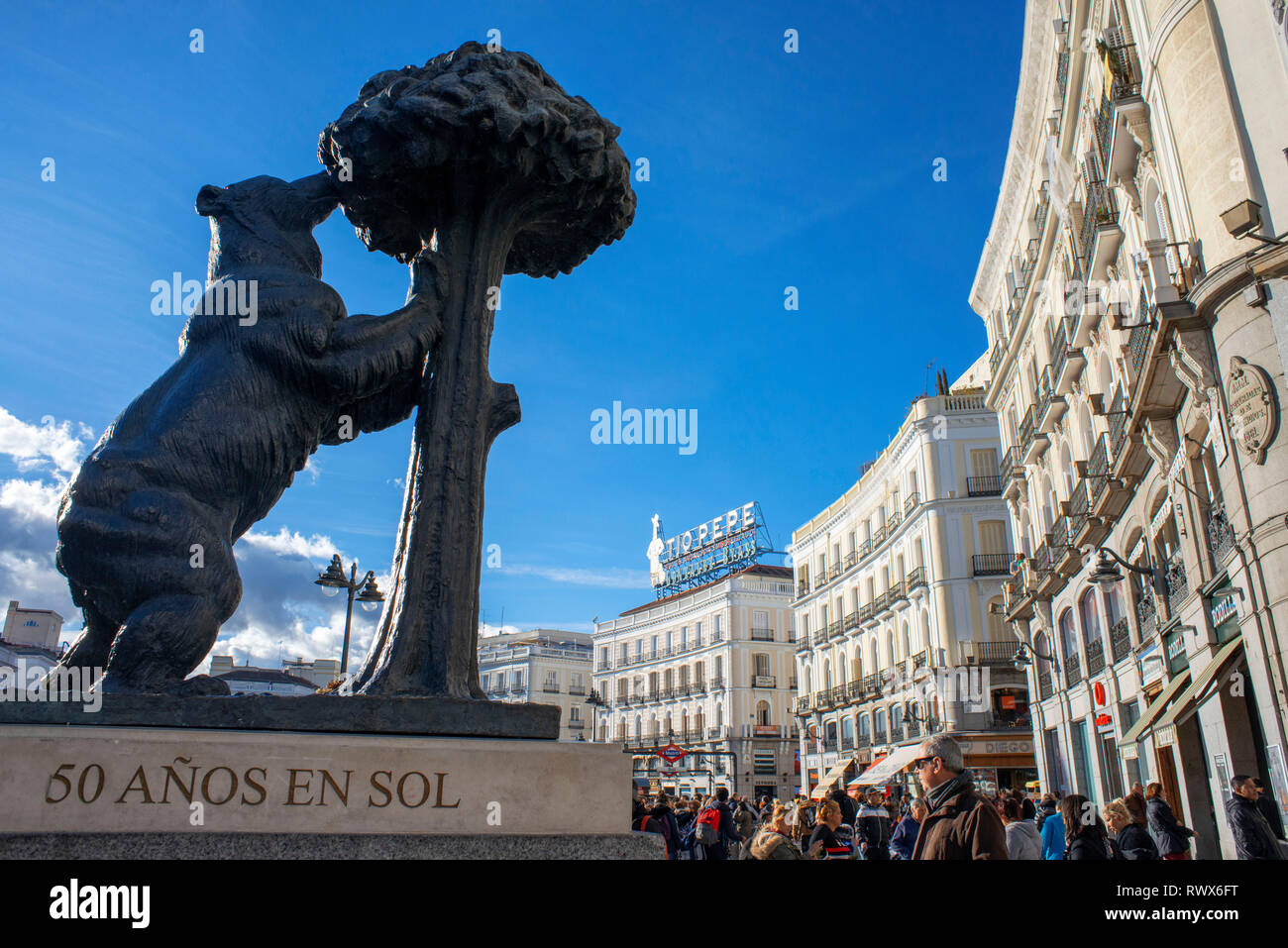 Statue of Bear and strawberry tree symbol of Madrid in Puerta del Sol ...