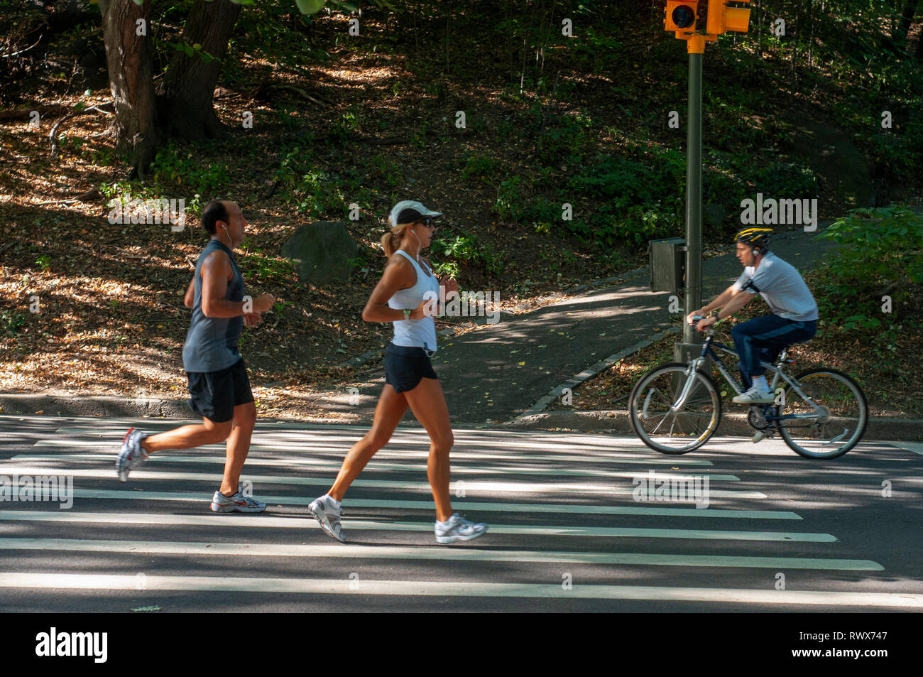 People running on the 1.57 mile (2.5k) path that encircles the ...