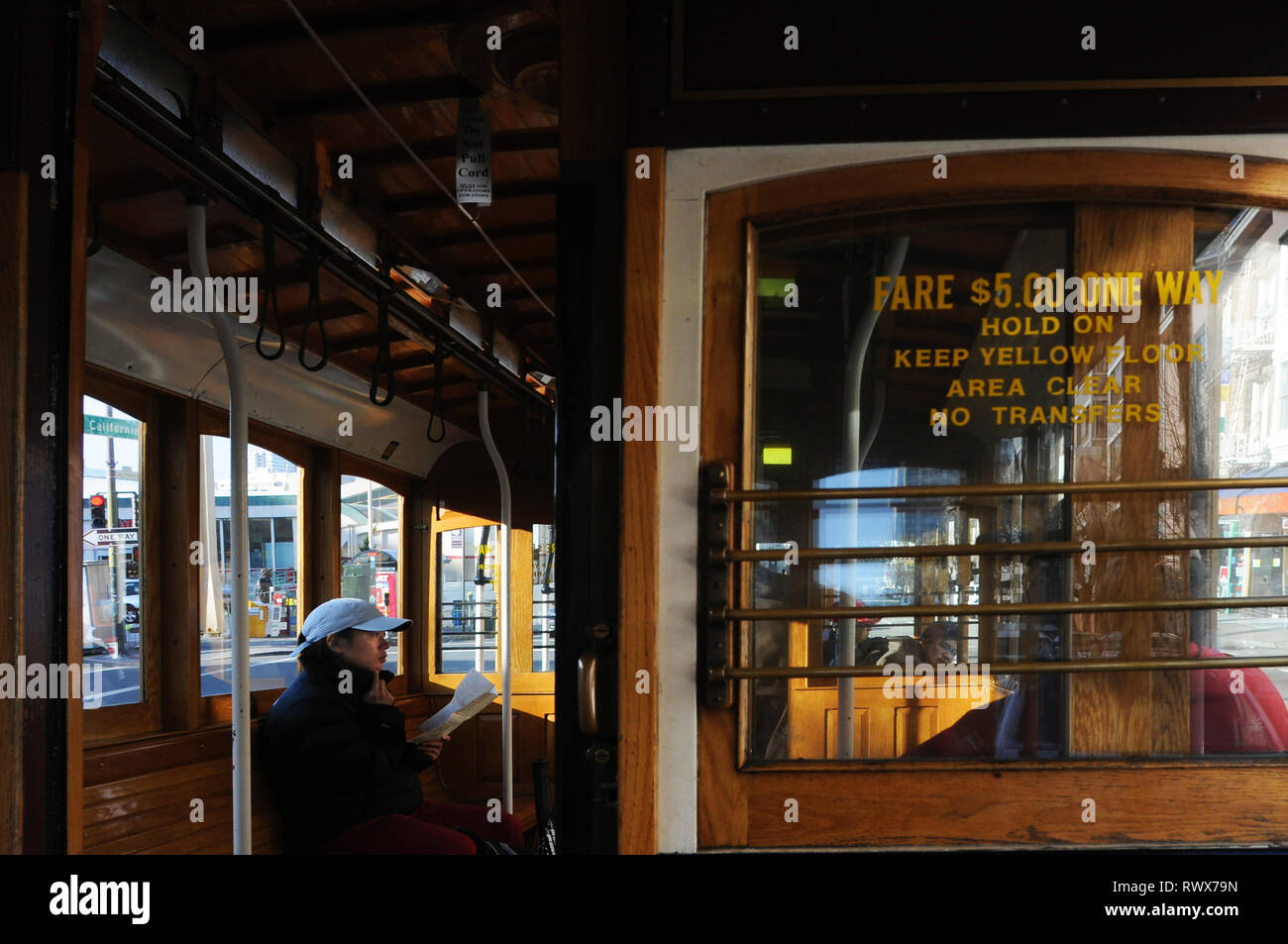 Classic view of historic traditional Cable Cars riding on famous ...