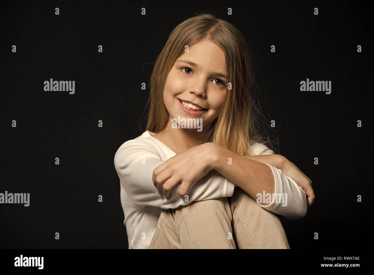 Cute and shy. Girl long hair cute smiling face relaxing, black ...