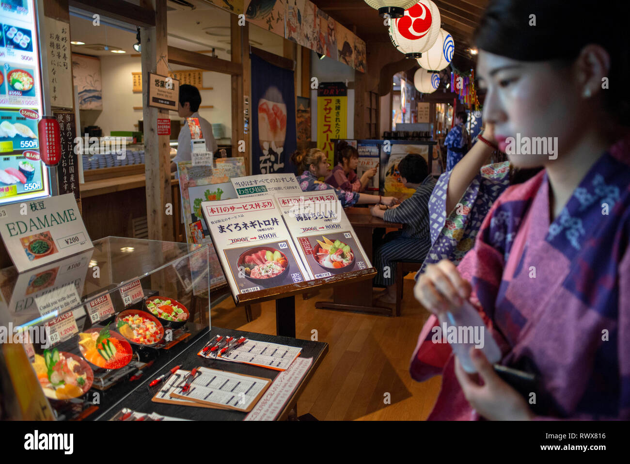 Local people eating at the Oedo Onsen Monogatari restaurant a 24 hour ...