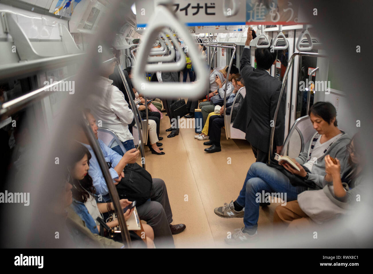 Tokyo metro train underground inside hi-res stock photography and ...