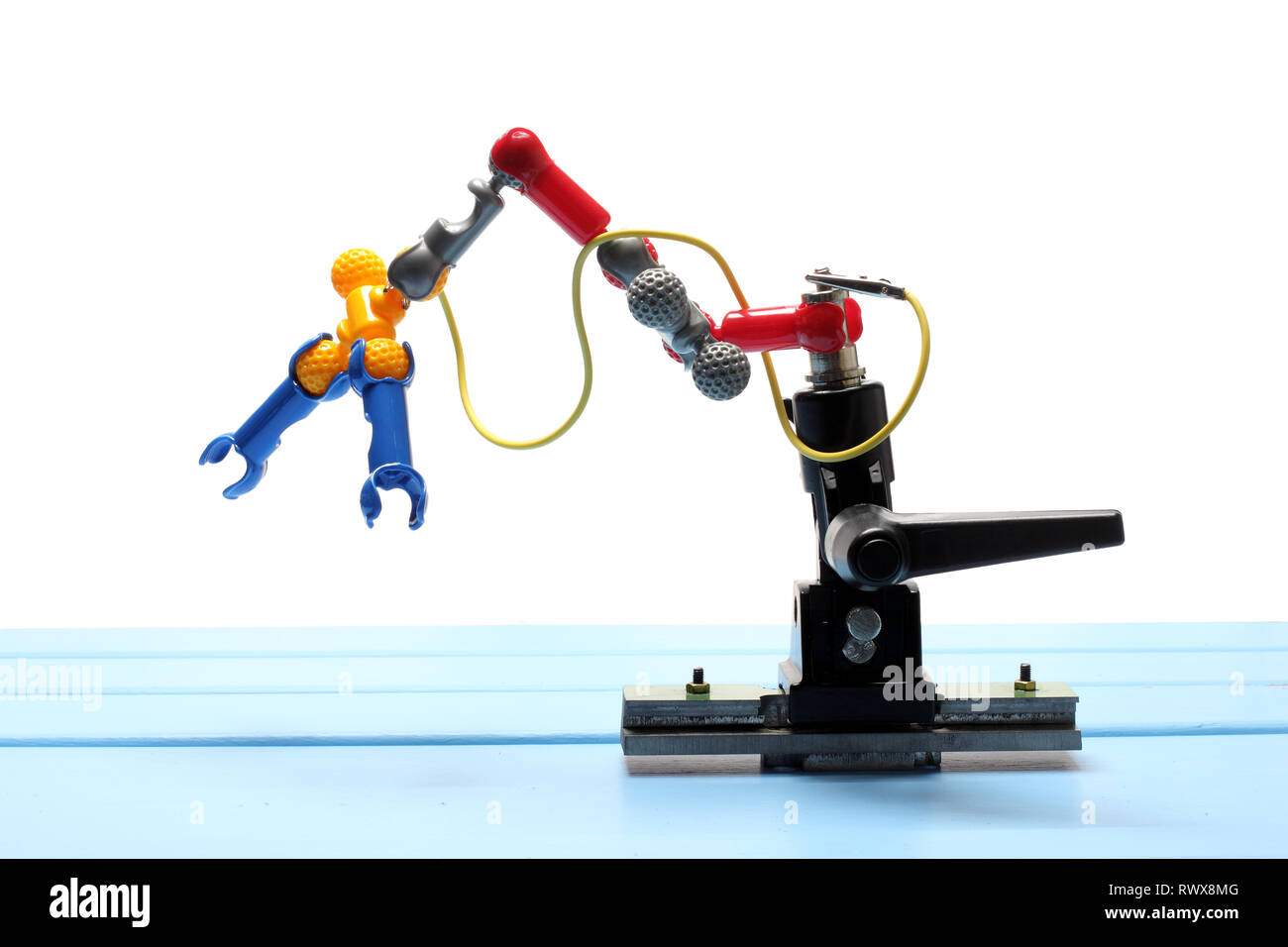 Toy Robotic Arm on White Background Stock Photo - Alamy