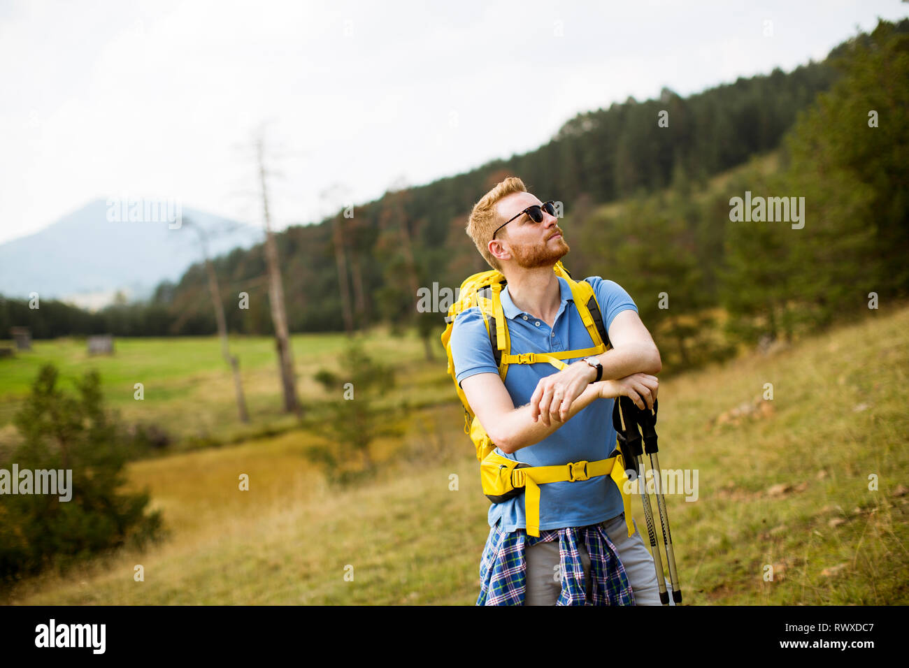 Active healthy man hiking at spring nature Stock Photo - Alamy