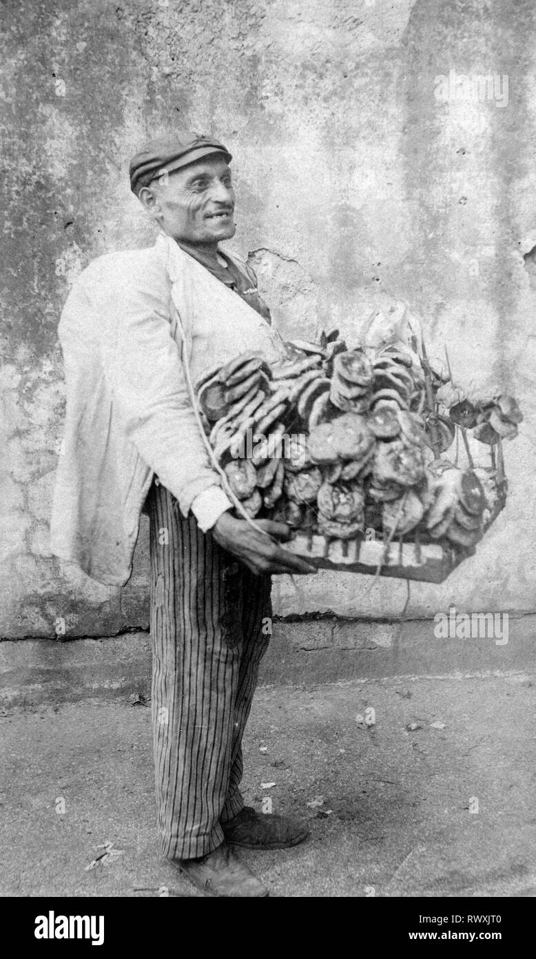 street vendor of sweet ring-shaped cakes, 1890-1900 Stock Photo - Alamy
