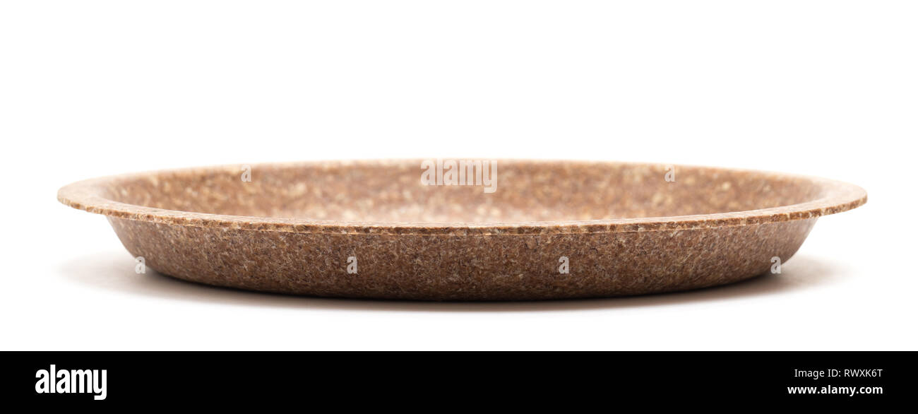 Biodegradable edible plate made from wheat bran isolated on white ...