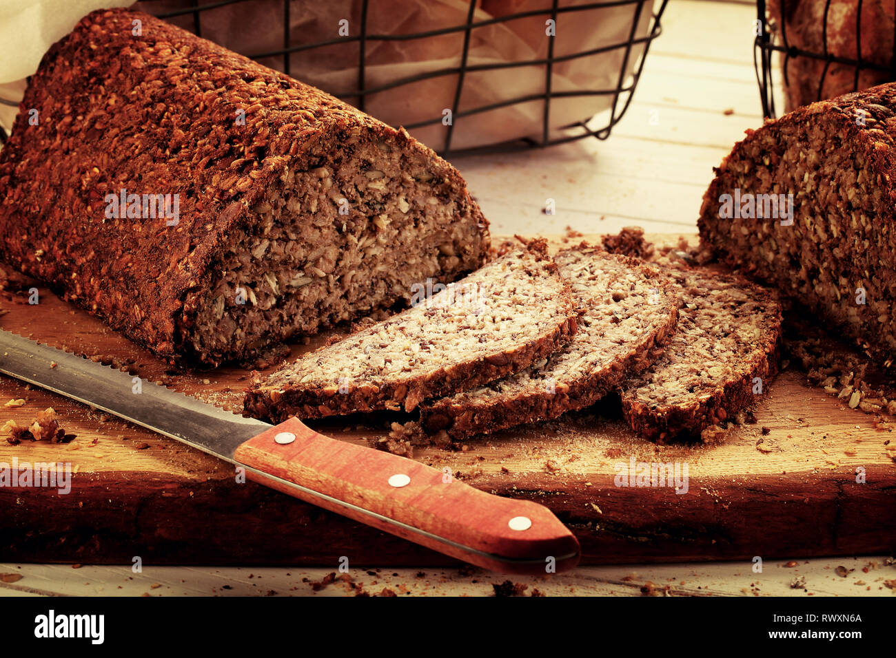 Male hands cutting bread on hi-res stock photography and images - Alamy