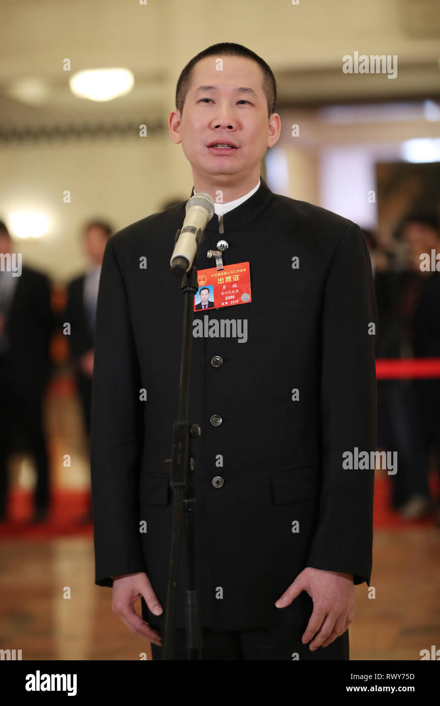Beijing, China. 8th Mar, 2019. Luo Peng, a deputy to the 13th National ...