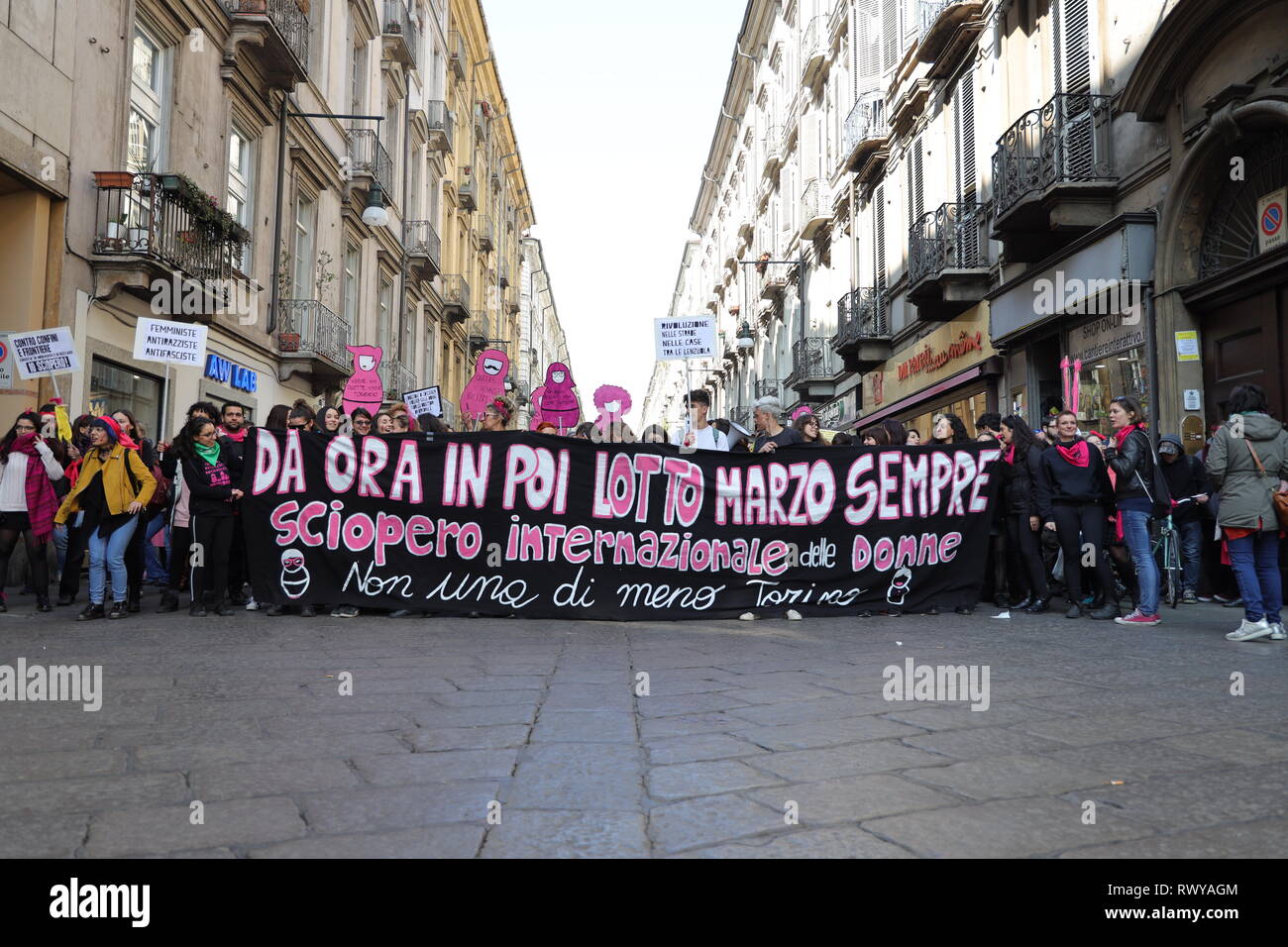Turin, Italy. 8th March 2019. Women go on strike and demonstrate to ...