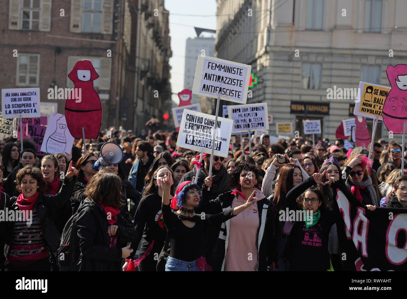Turin, Italy. 8th March 2019. Women go on strike and demonstrate to ...