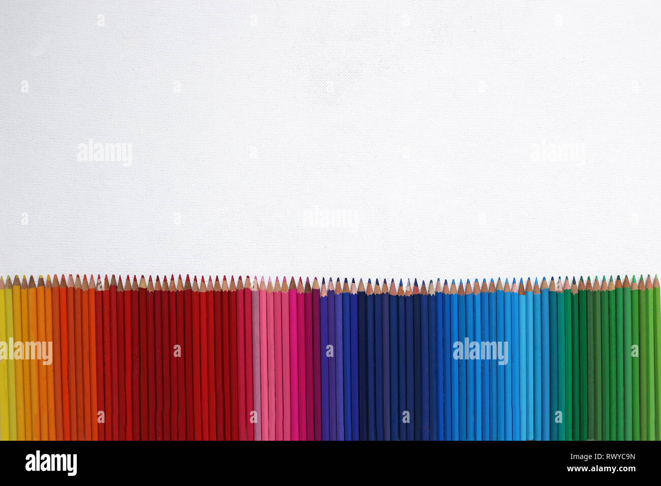 A line of coloured pencils Stock Photo - Alamy