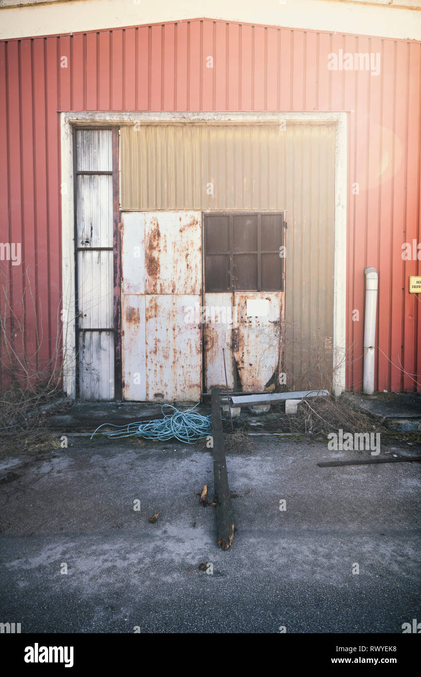 abandoned and rusty factory door warehouse Stock Photo - Alamy