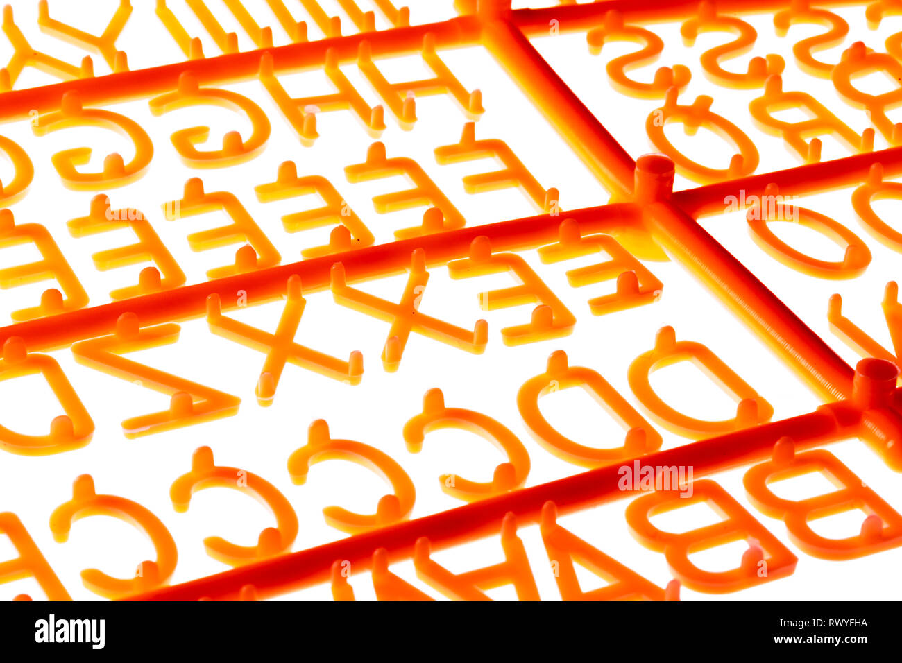 Letters, on a cast strand, for texting a text board Stock Photo - Alamy