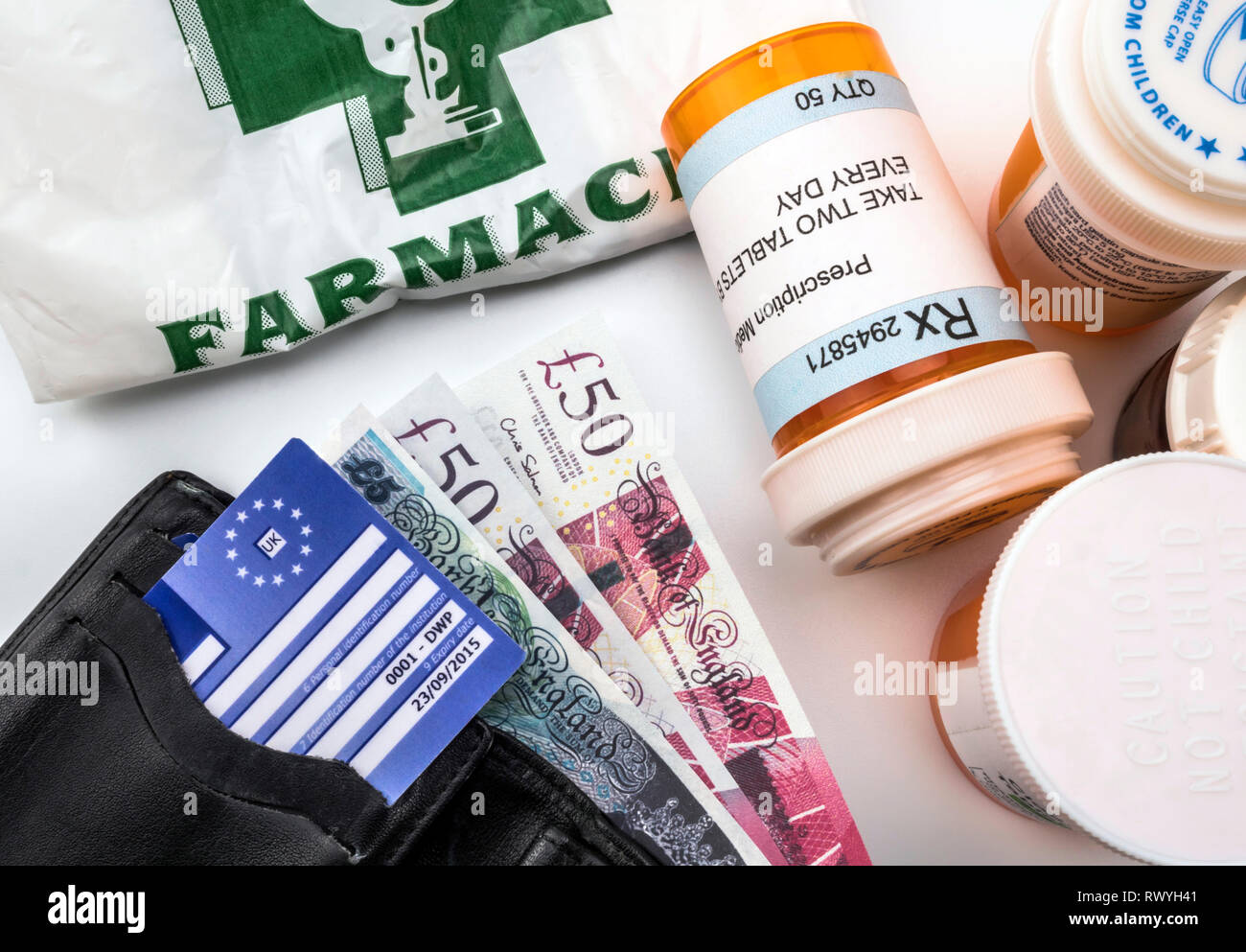 European health insurance card along with several capsules, concept of ...