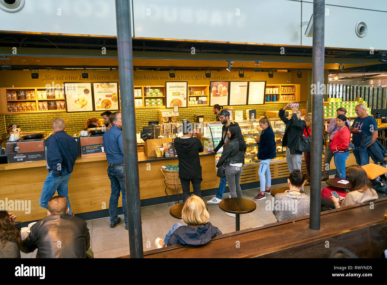 Queue Line People Starbucks Cafe High Resolution Stock Photography and ...