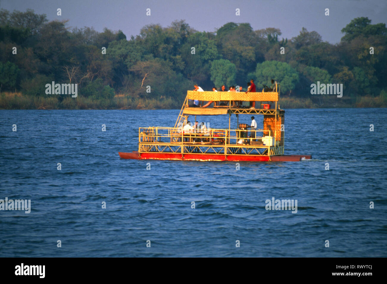Basic and hazardous boat trip on river Zambezi, Zimbabwe Stock Photo ...