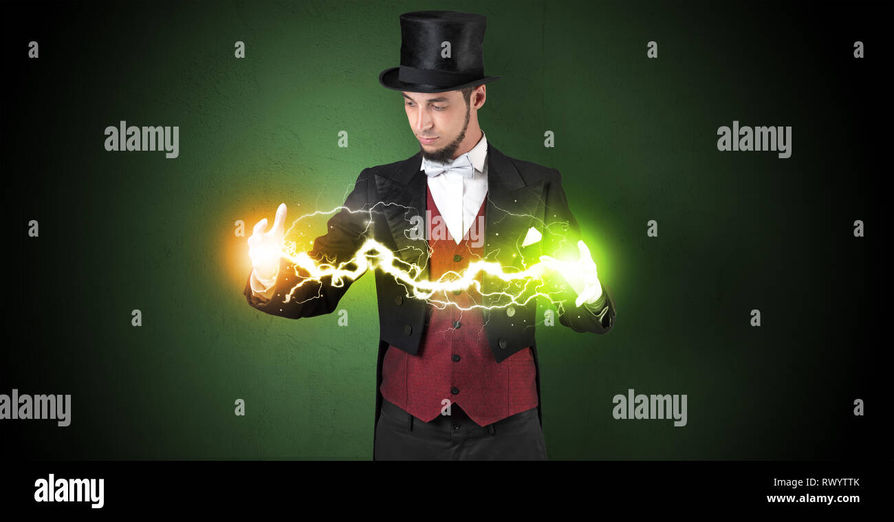 Magician sparkling super power between his two hands Stock Photo - Alamy Magician sparkling super power between his two hands Stock Photo - Alamy