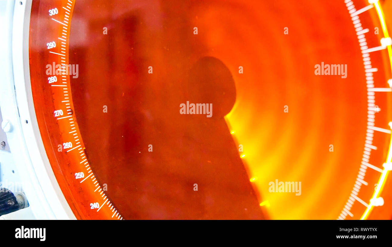 Moving straight lines from the orange radar in the warship. It is one ...