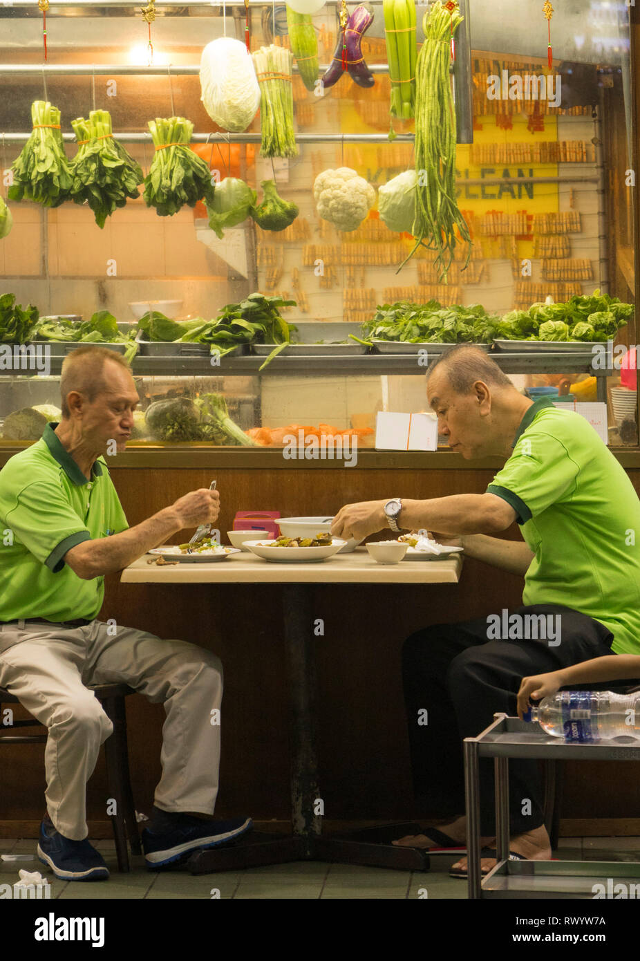 Two men eating outside hi-res stock photography and images - Alamy