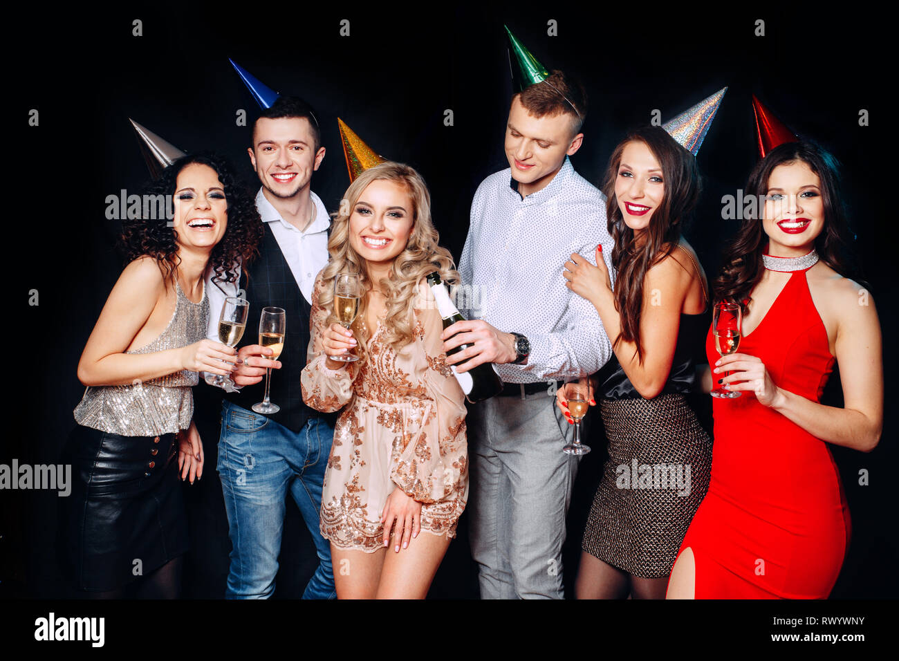 Friends making big party in the night. Six people having fun and ...