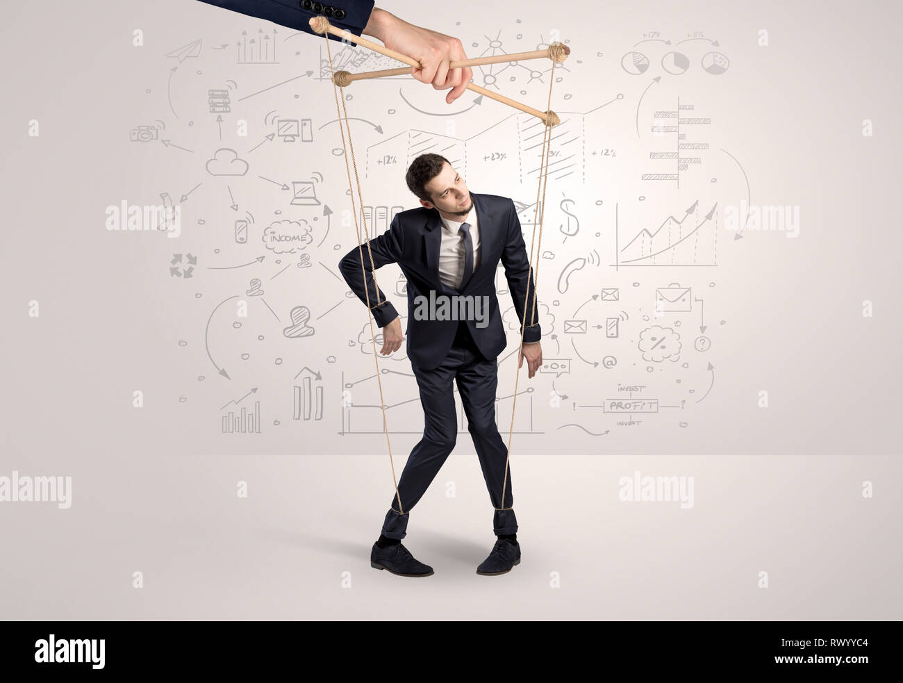 Little businessman controlled from above like a puppet concept Stock ...