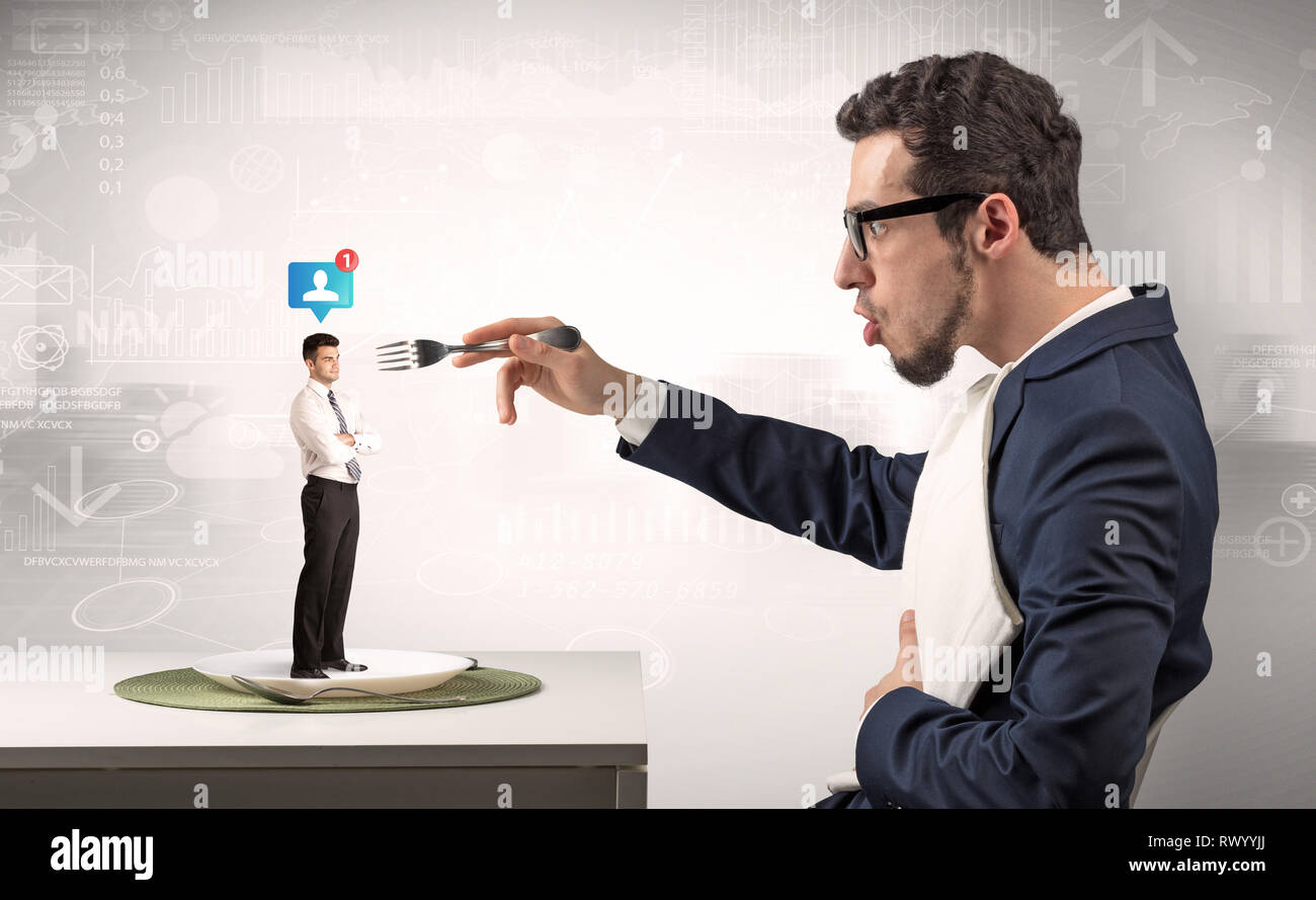 Giant businessman eating small man with financial background Stock ...