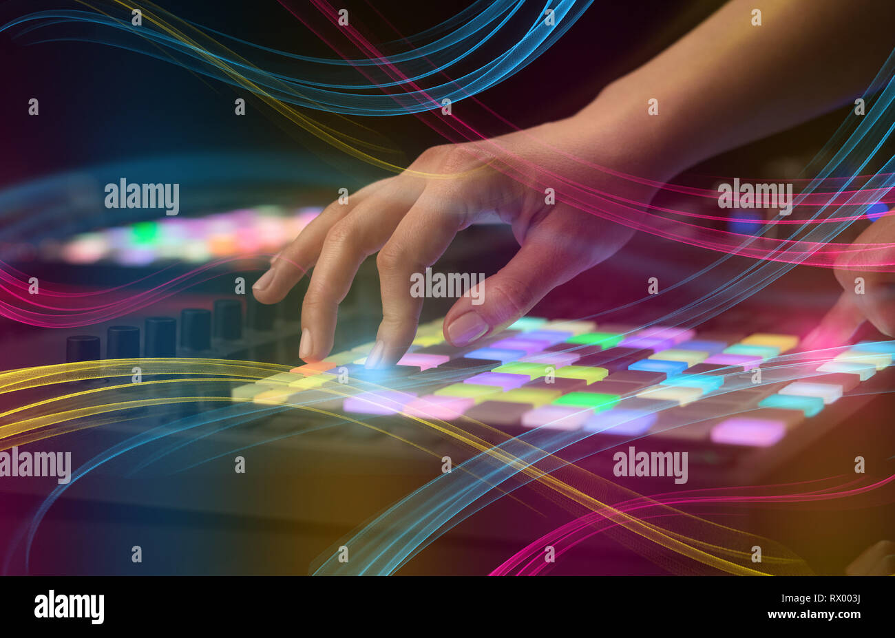 Hand mixing music on midi controller with colorful vibe concept Stock ...