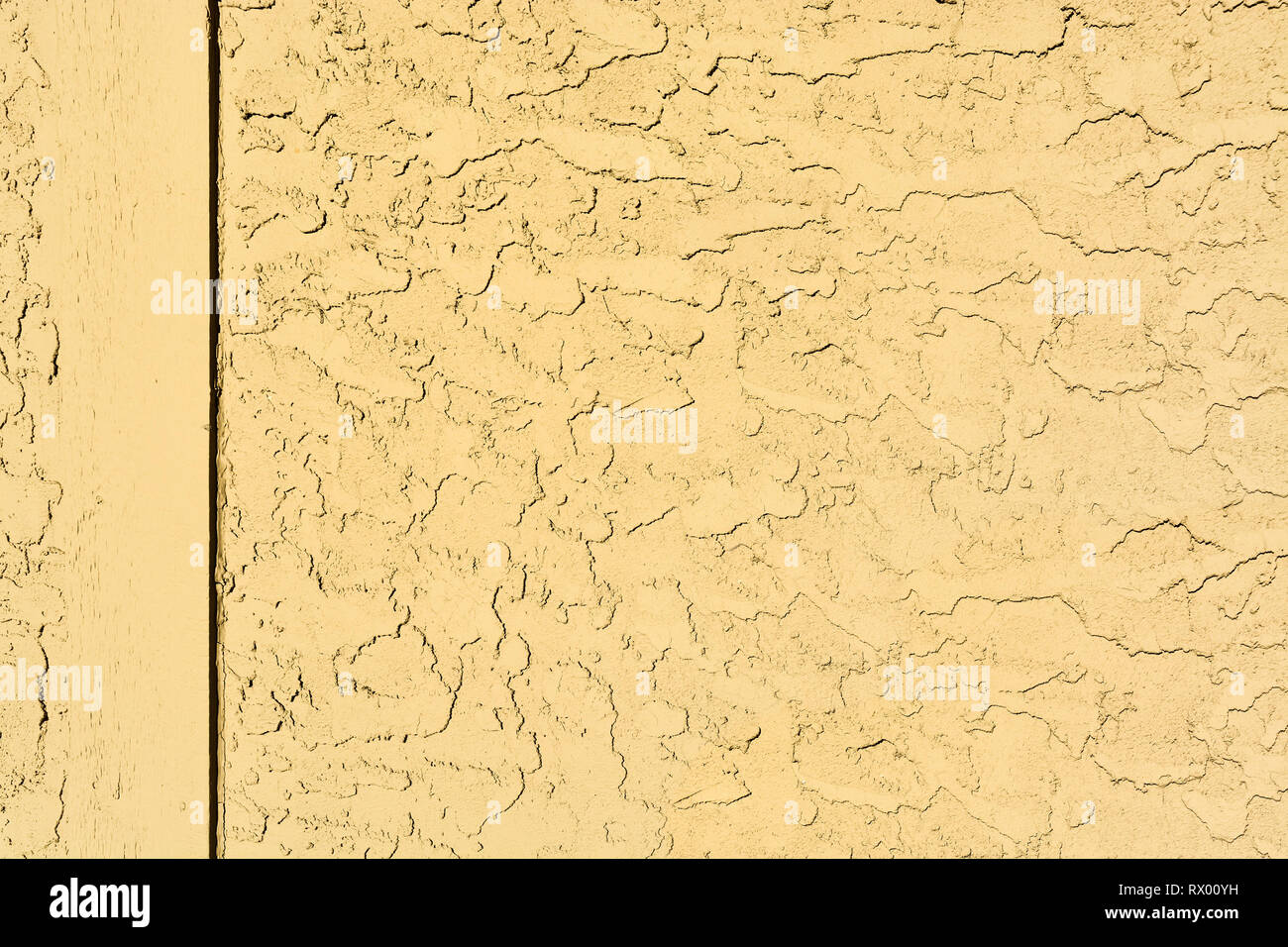 Yellow mortar wall texture with wooden border Stock Photo - Alamy