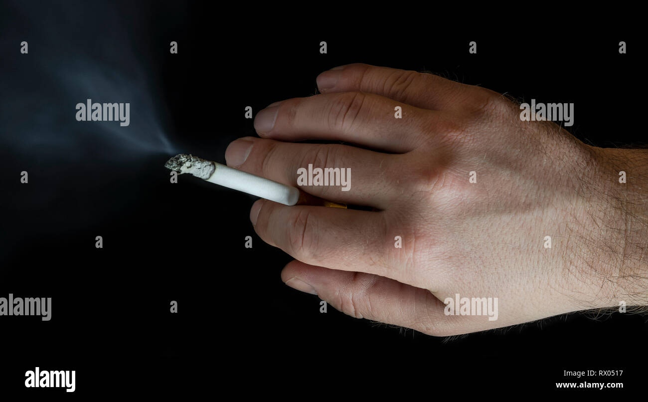 A burning cigarette in hand is a disease that is difficult to treat ...