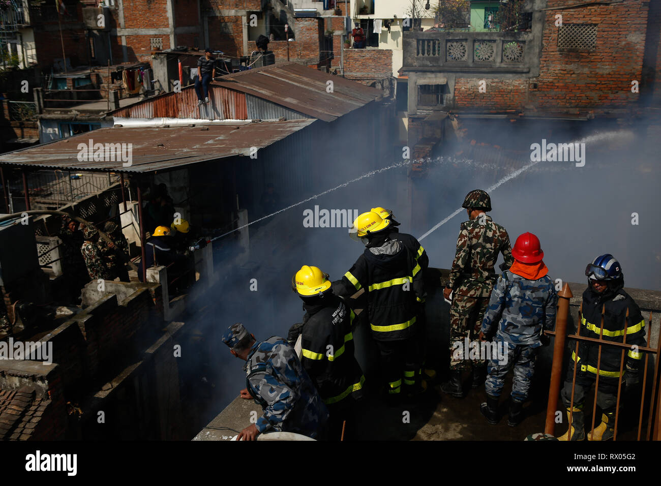 Fire fighters seen working hard to extinguish the fire. Fire broke out ...