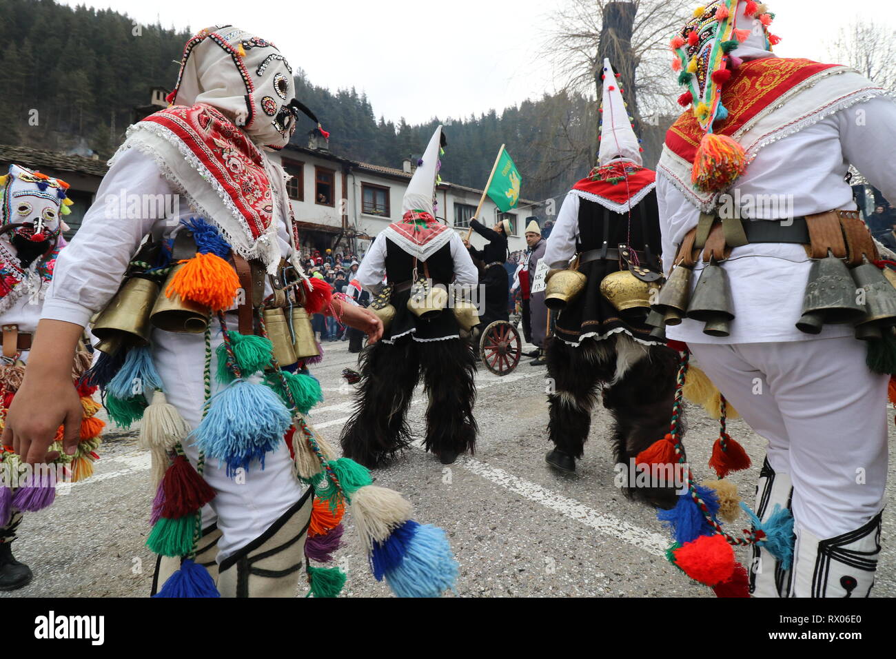People in in traditional Kukeri costume are seen at the Festival of the ...