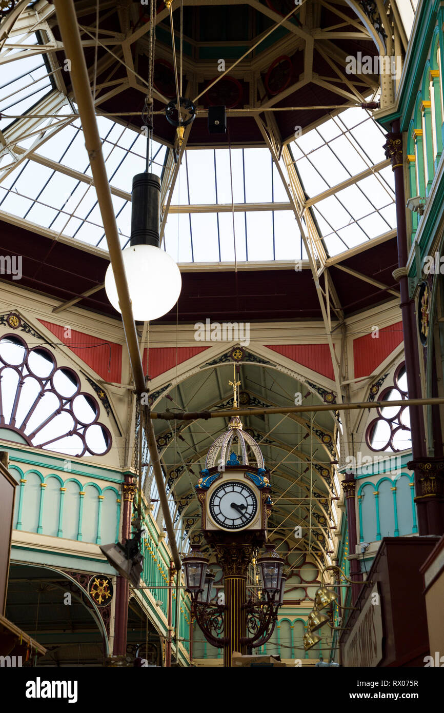 Central clock below the domed glass window and iron centre roof ...