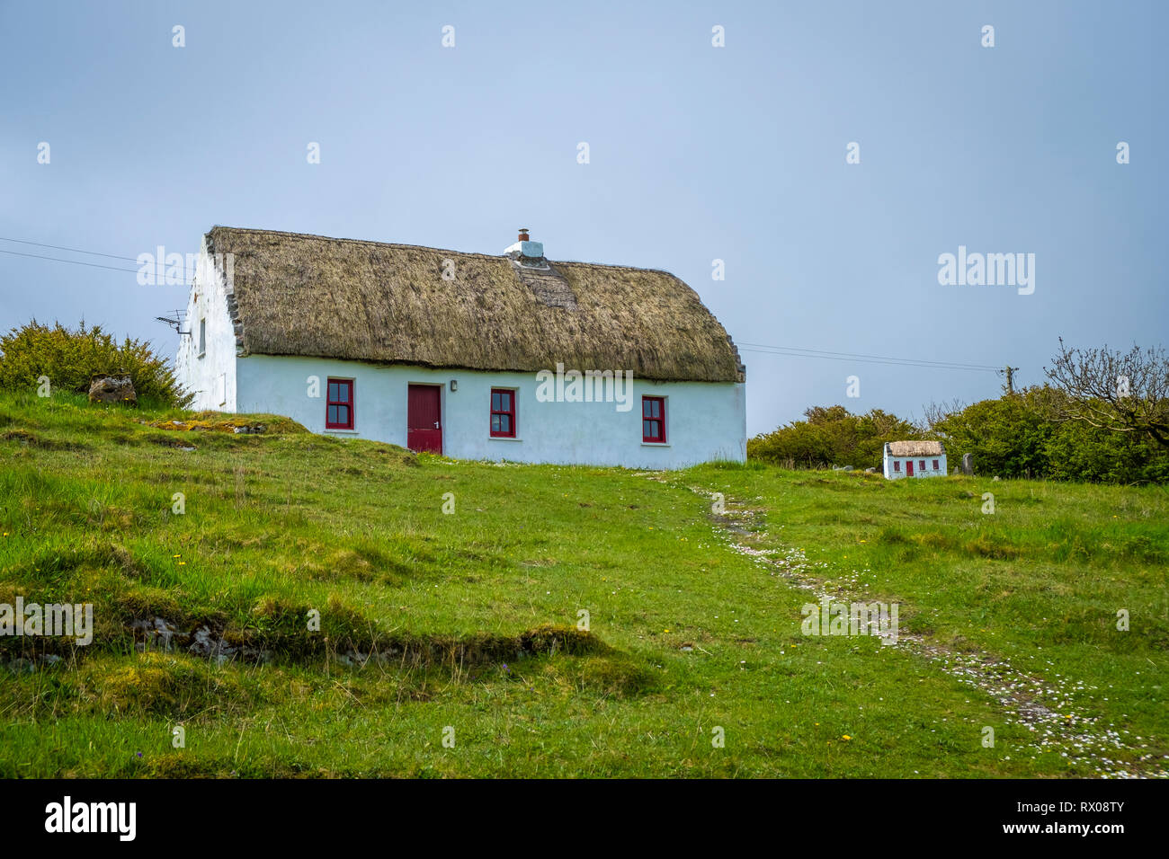 common reed houes on Inishmore, Aran Island, Ireland Stock Photo - Alamy