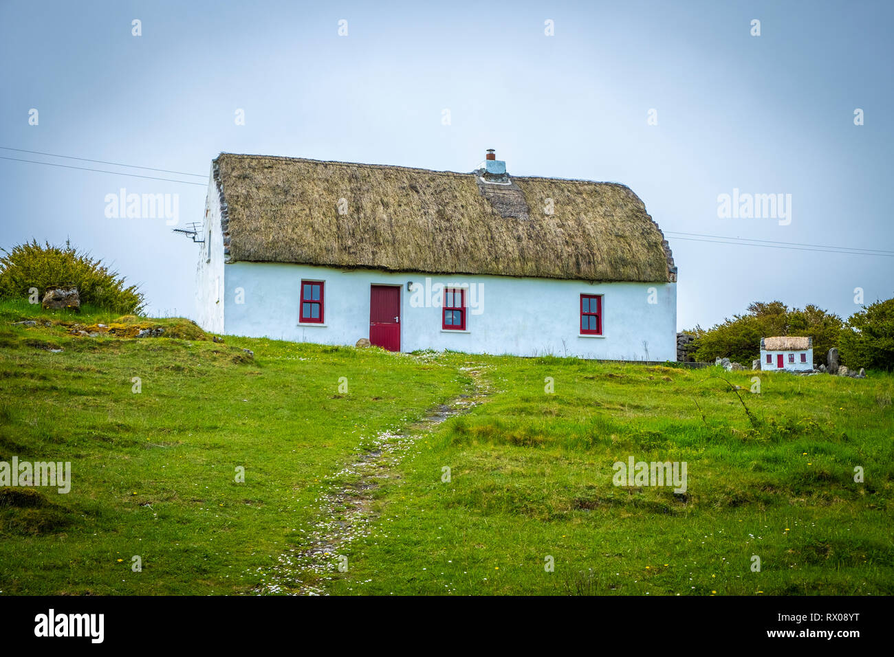 common reed houes on Inishmore, Aran Island, Ireland Stock Photo - Alamy